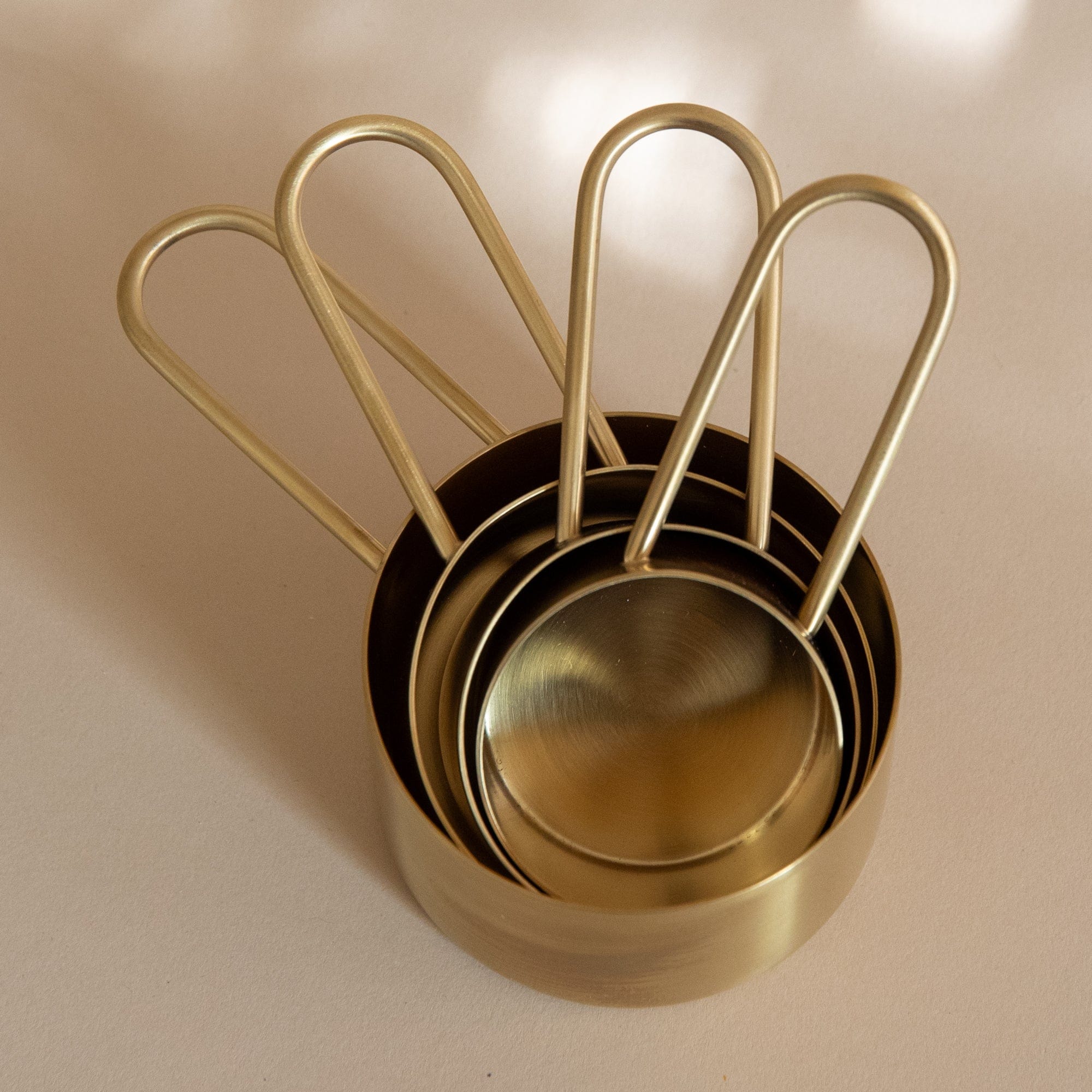Measuring Cups in Brass